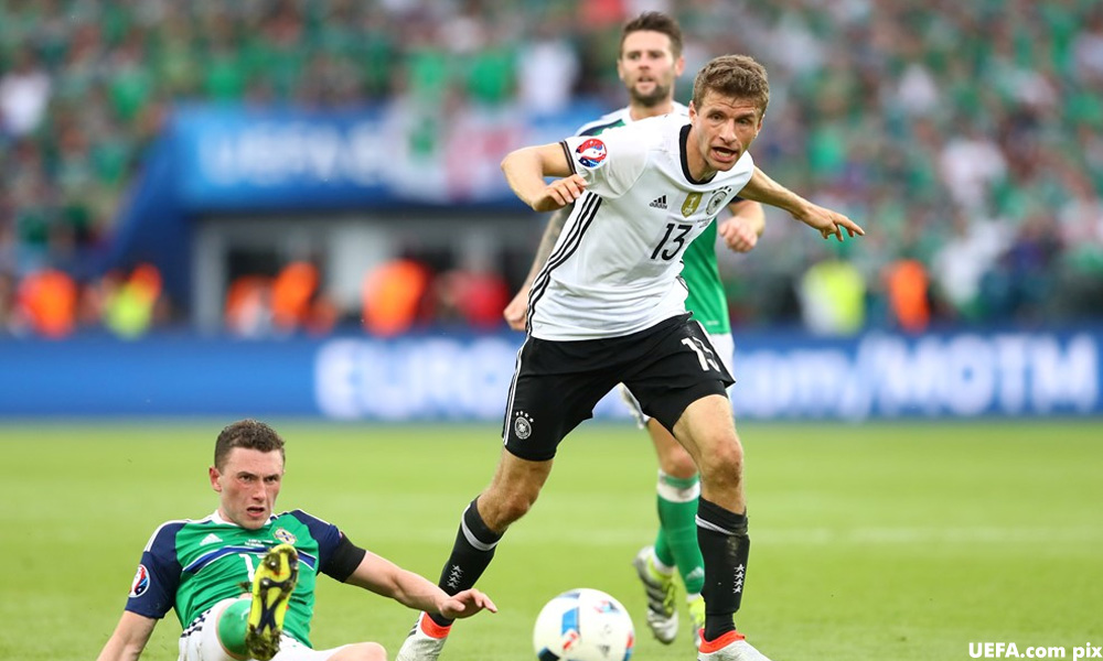 Germany beat N Ireland to advance as group winners