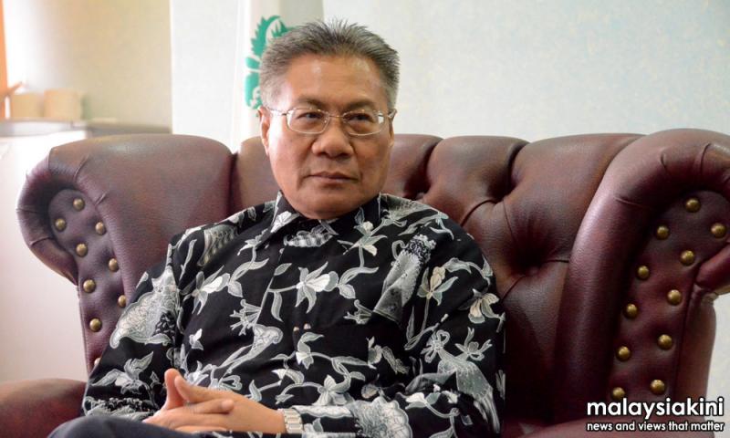 Overlooked for cabinet, Mansor Othman remains Anwar loyalist