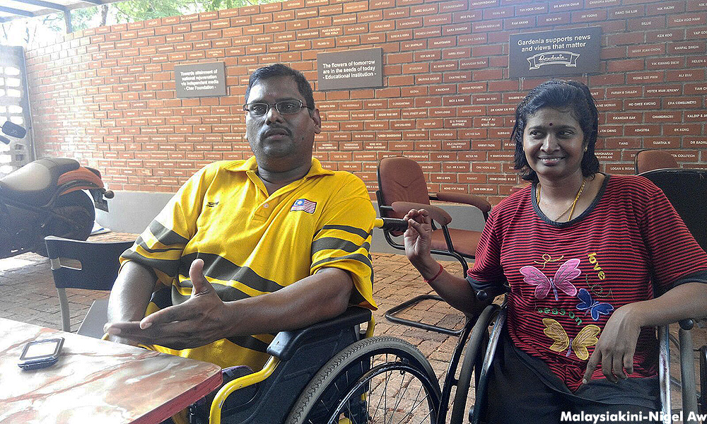 Disabled couple forced to crawl down staircase